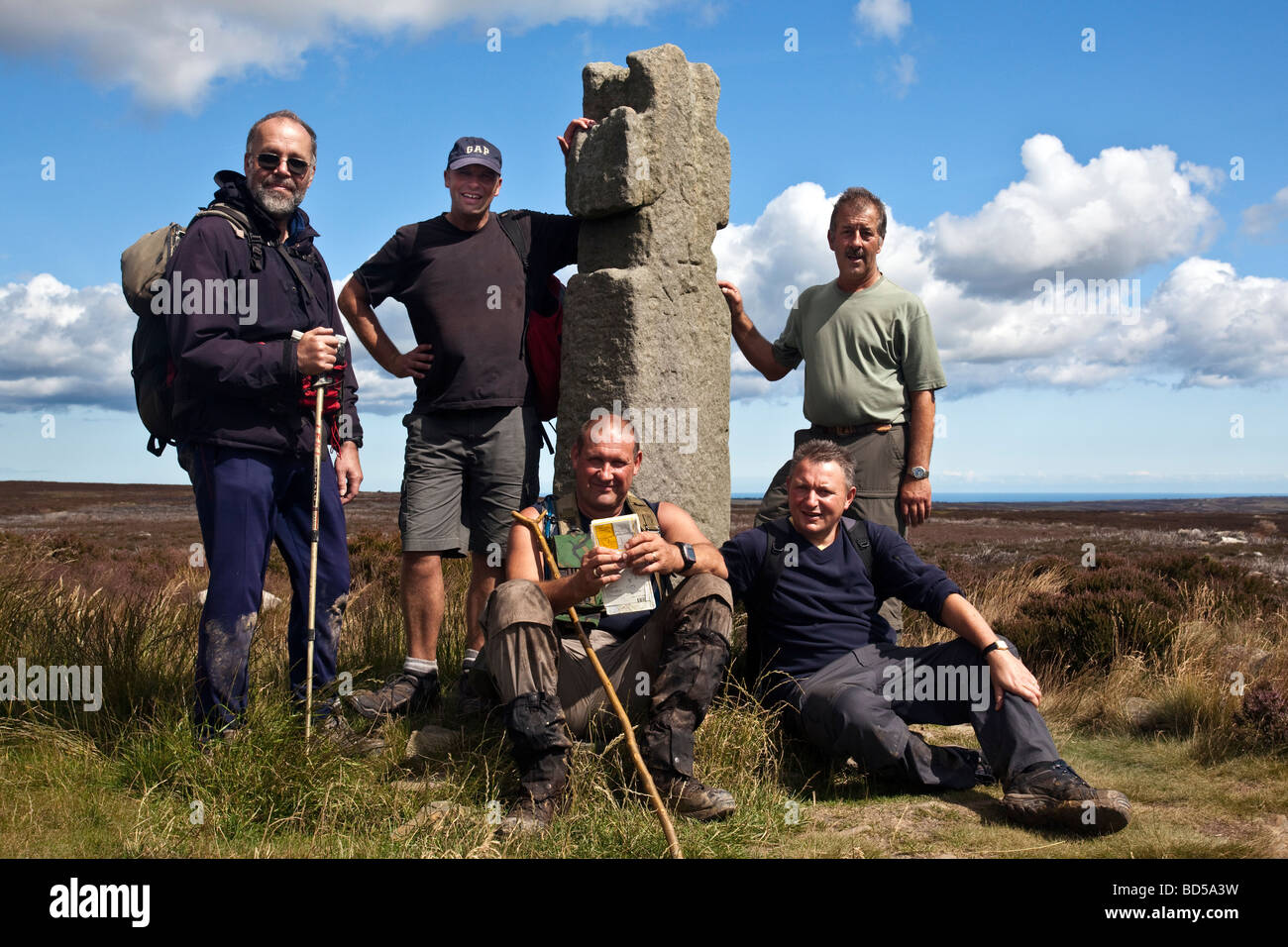 Walkers on the Lyke Wake Walk Lilla Cross Fylingdales Moor North ...