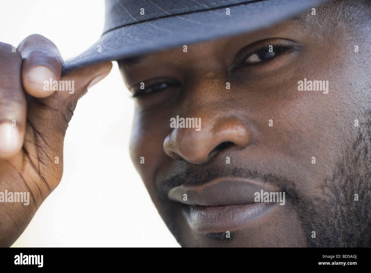 A man outdoors wearing a hat Stock Photo - Alamy
