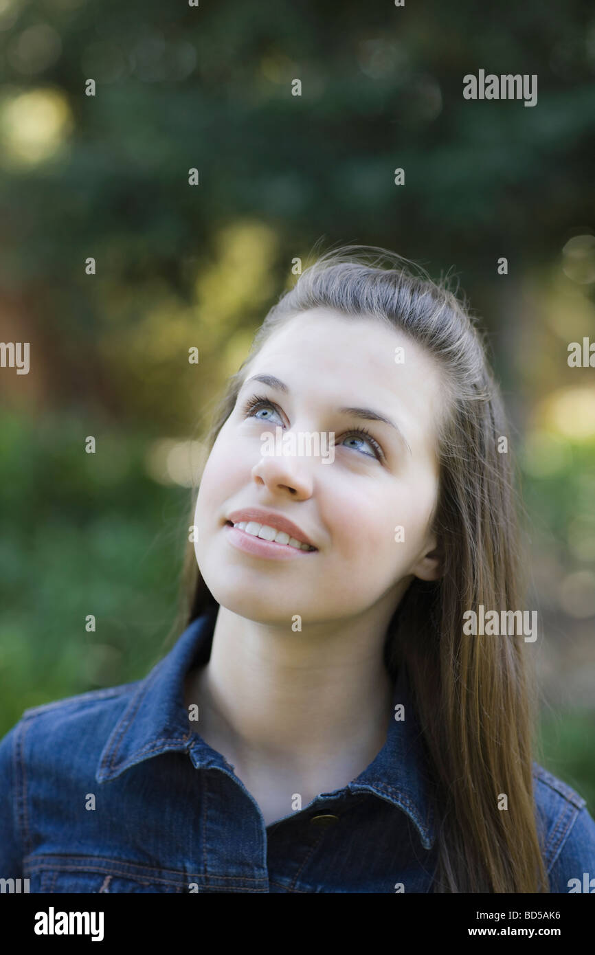 A woman outdoors smiling Stock Photo - Alamy