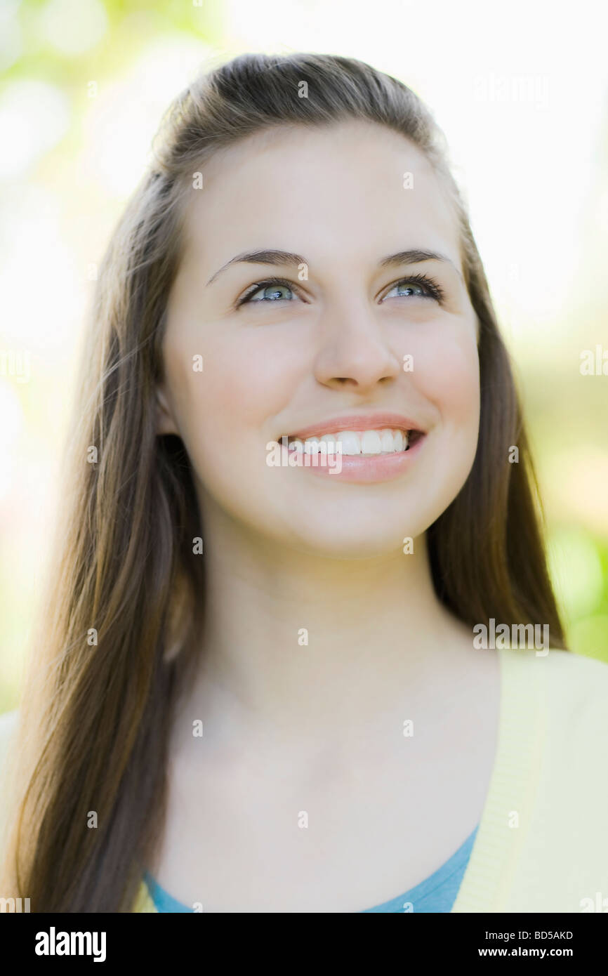 A woman outdoors smiling Stock Photo - Alamy