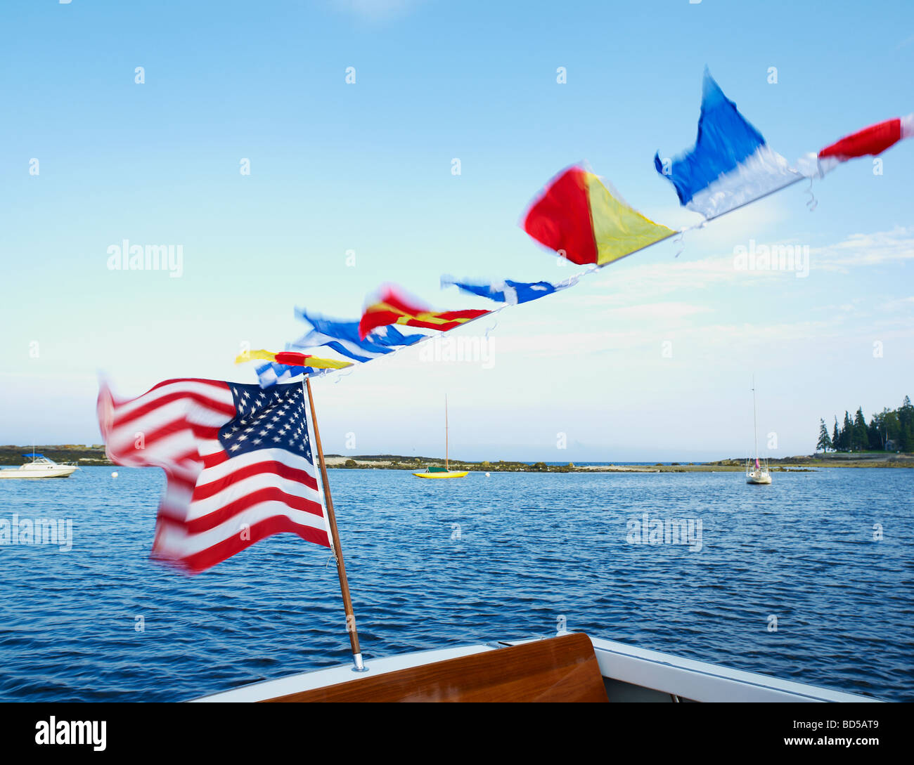 A boat with an American flag Stock Photo - Alamy