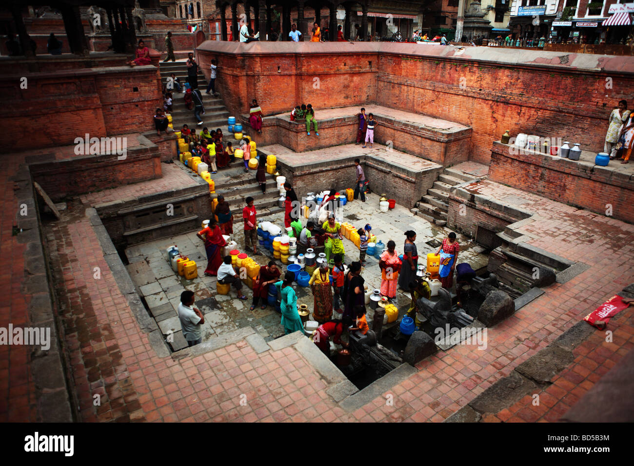 Water bucket queue hi-res stock photography and images - Alamy