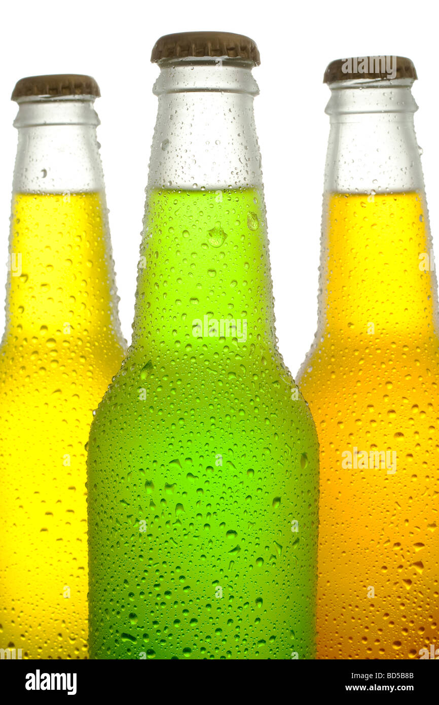 Three cold beverages in wet glass bottles Stock Photo - Alamy