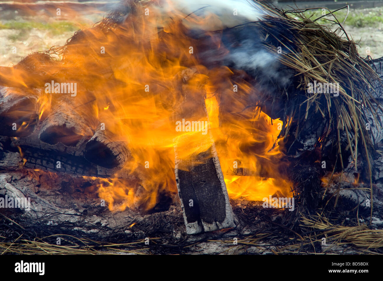 funeral pyre by the bagmati river during a cremation Stock Photo - Alamy