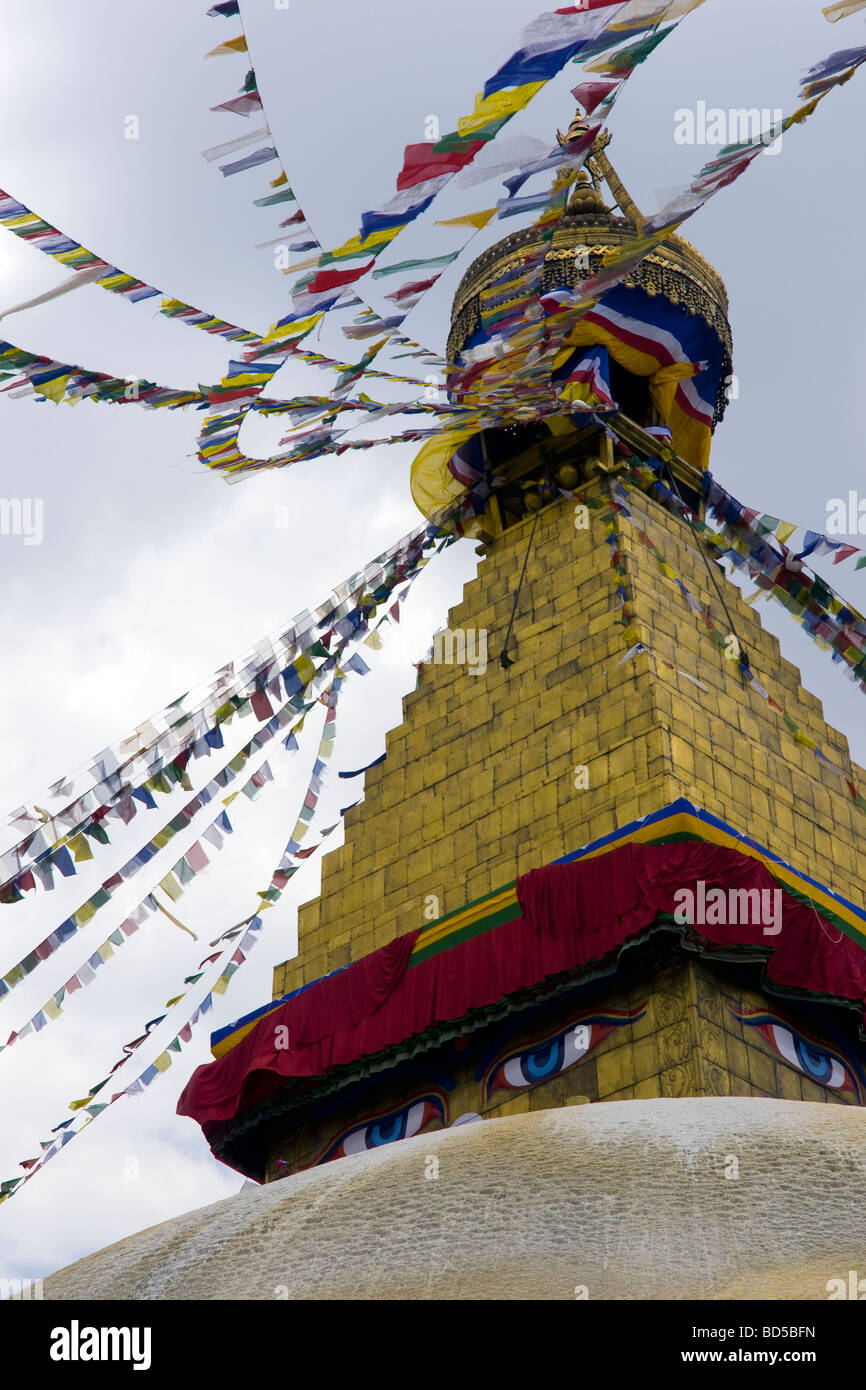 chorten or stupa with prayer flags and all seeing eyes of buddah Stock ...