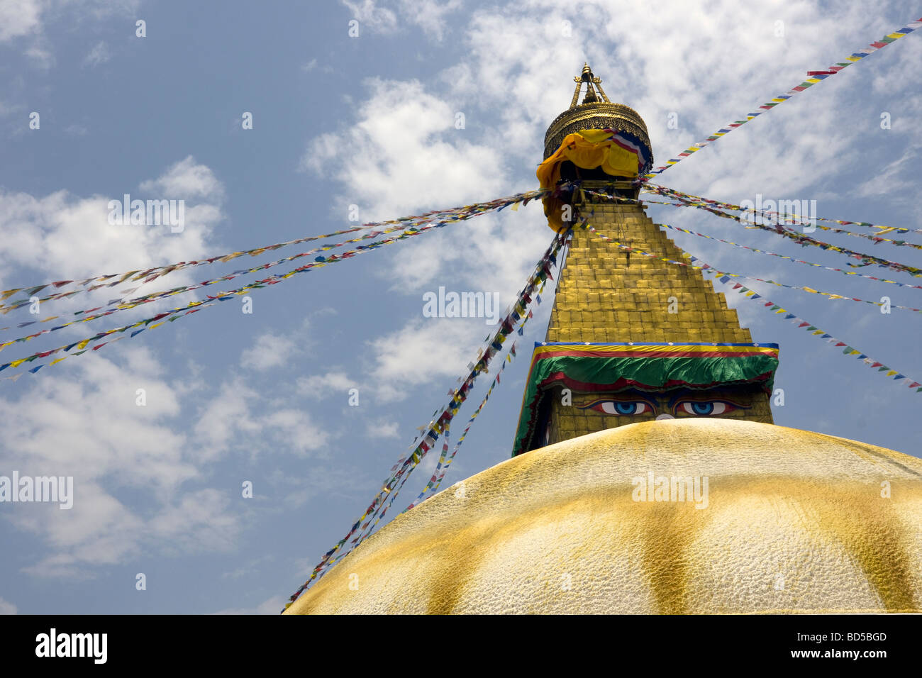 the main chorten or stupa with prayer flags and the all seeing eyes ...