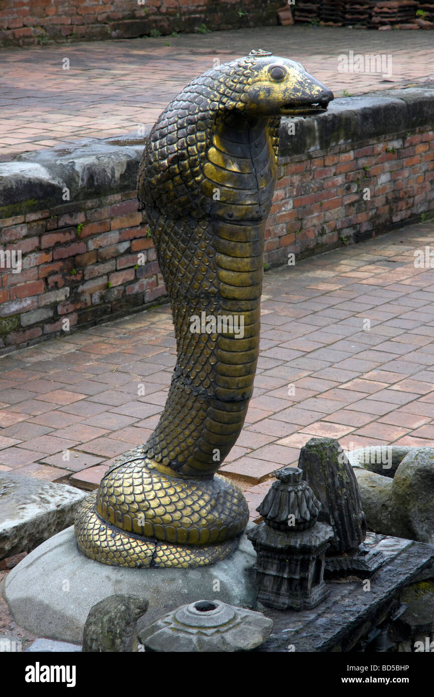 golden snake statue at the royal bathsdurbar square Stock Photo - Alamy