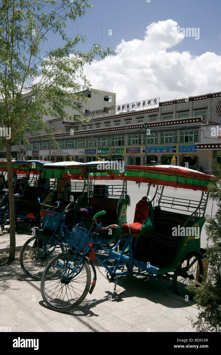 traditional chinese cycle rickshaws waiting for customers in lhasa ...