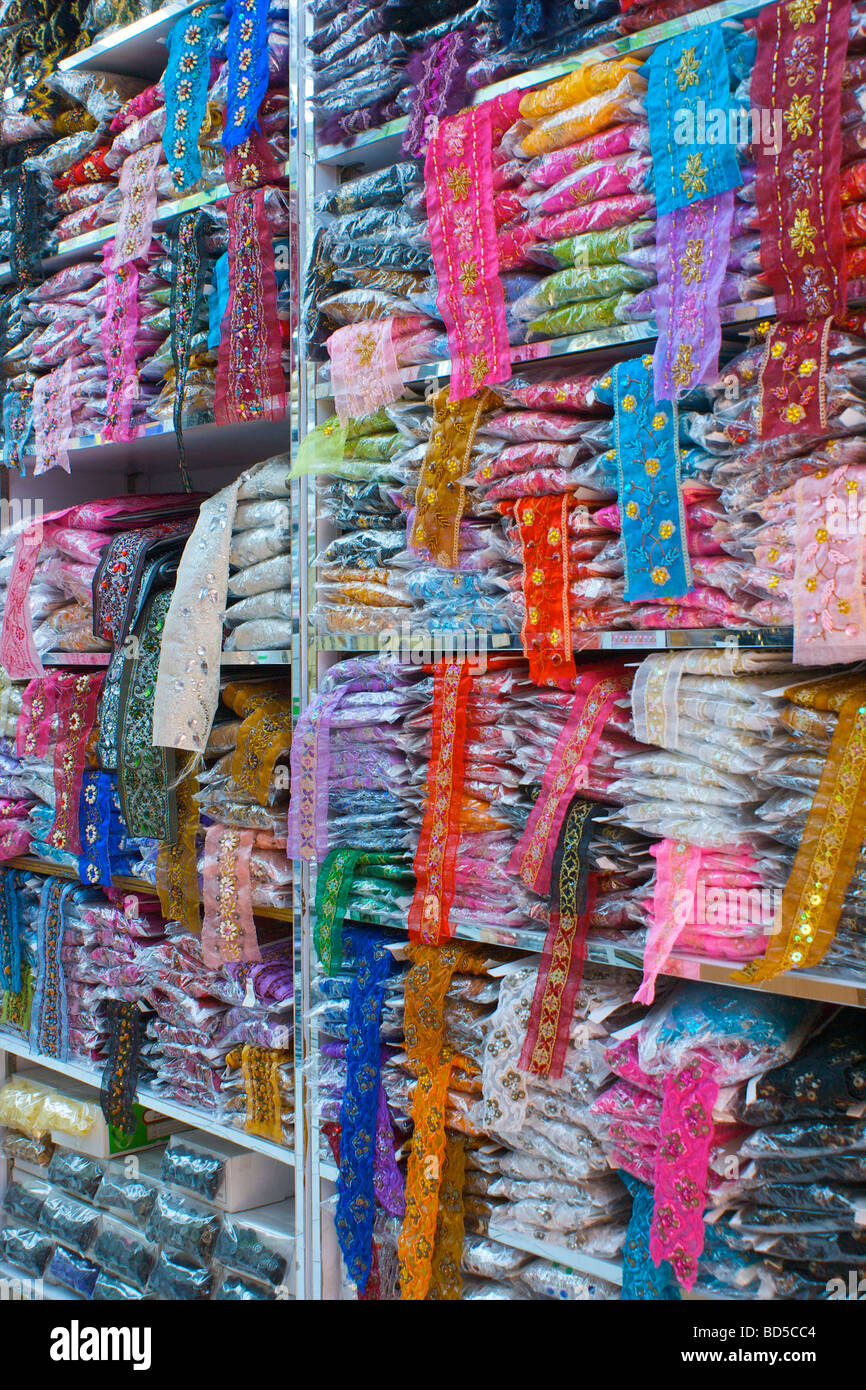 Shelves filled with braids and decorative garments in Deira Dubai ...