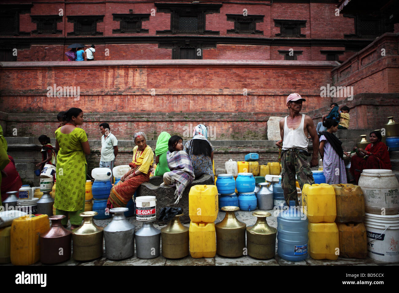 People queuing up for water at a public water tap, Nepal Stock Photo ...