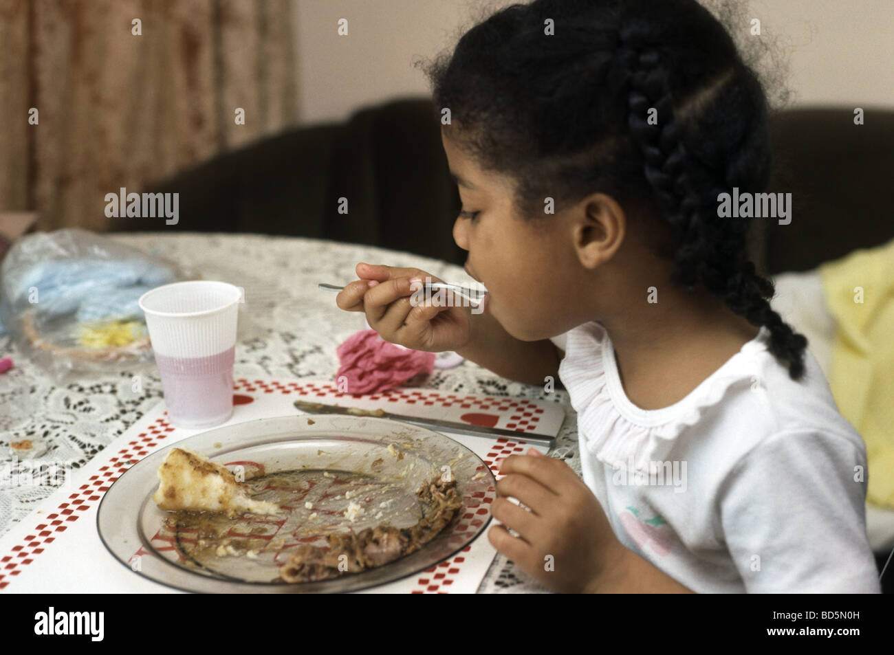 Black Child Eating Breakfast