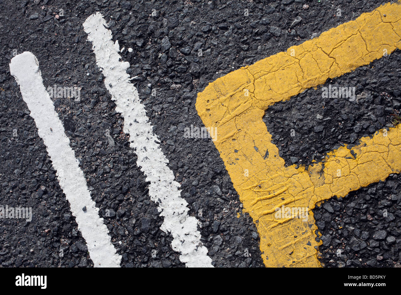 Close-up of road marking - paint and tarmac Stock Photo - Alamy