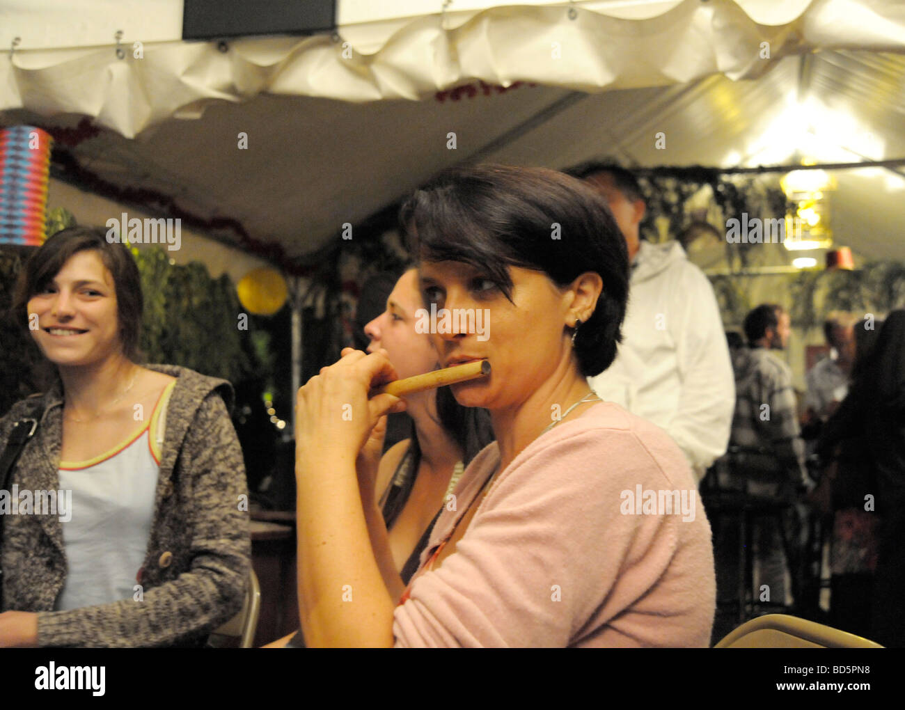 Flute playing women hi-res stock photography and images - Alamy