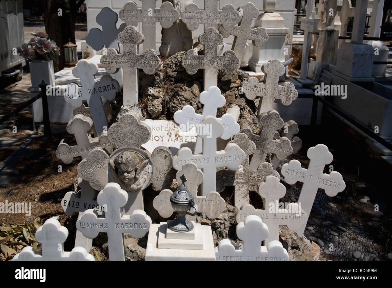 A grave in Athens First Cemetery with a cluster of crosses, Athens ...