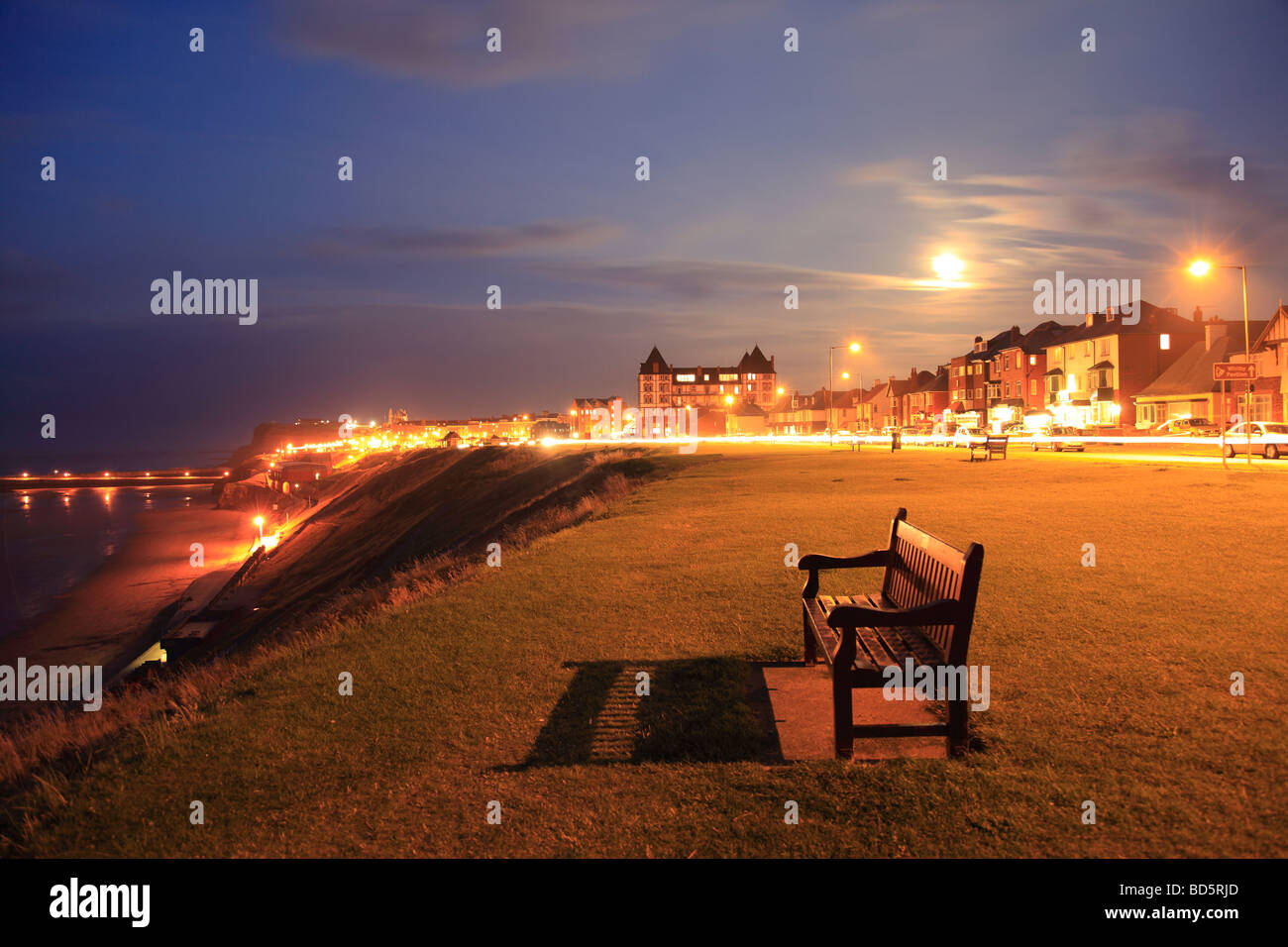 Whitby by night -West cliff, Harbour and moon view Stock Photo - Alamy