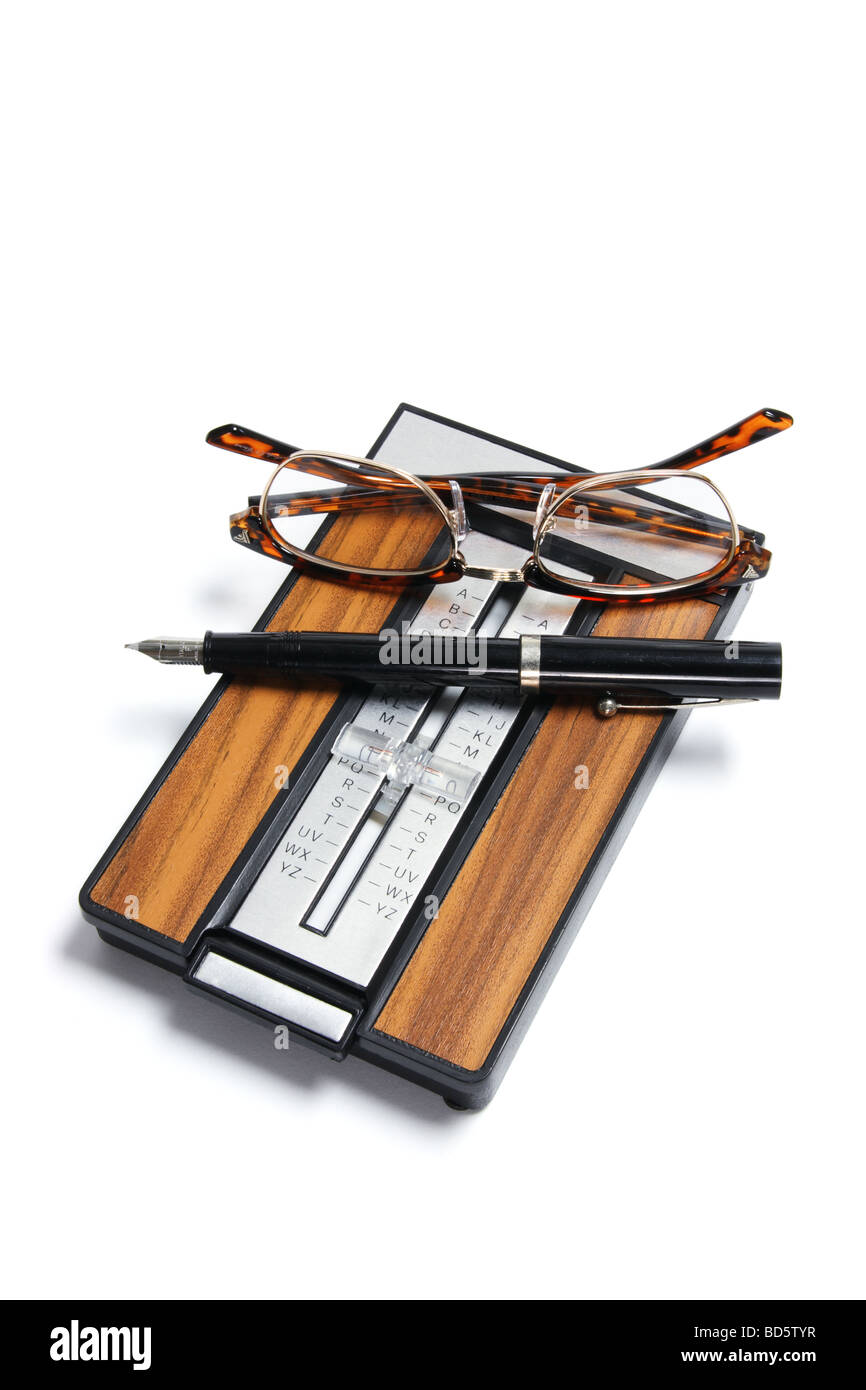 Phone Index Organizer with Pen and Eyeglasses Stock Photo - Alamy