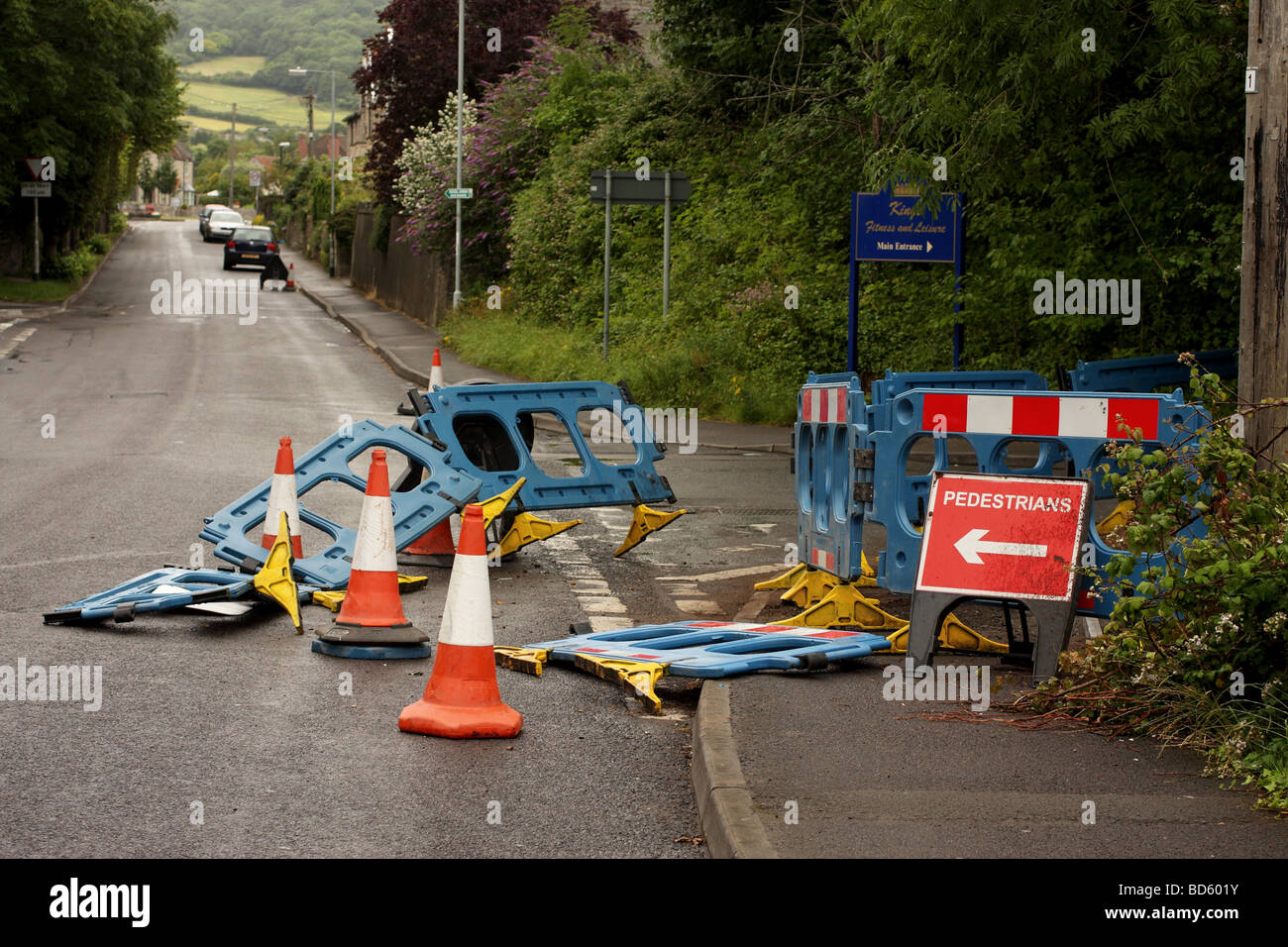 Road works signs knocked over by traffic Stock Photo - Alamy