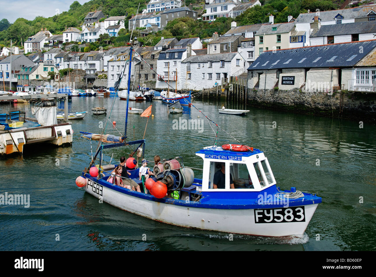 boats in the harbour at polperro in cornwall, uk Stock Photo - Alamy