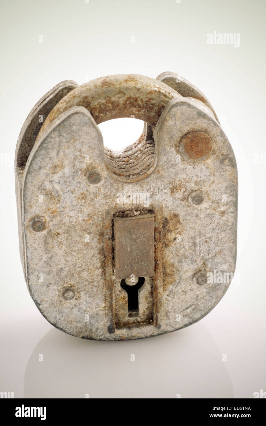 rusty old fashioned metal lock against a white background Stock Photo ...