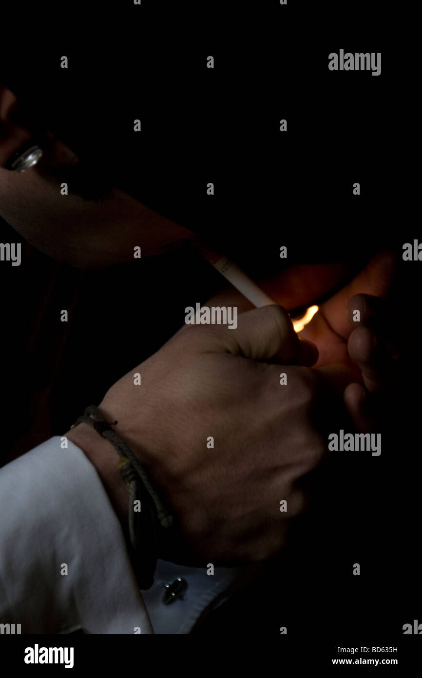 Smoking smoker cigarette smoke fire hi-res stock photography and images ...