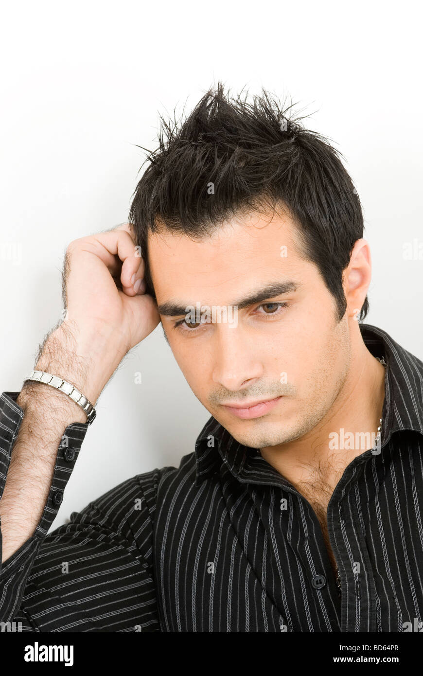 Handsome thinking male model hi-res stock photography and images - Alamy
