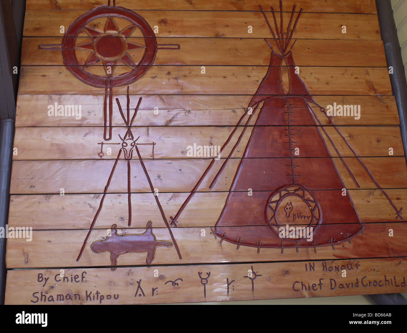 Wooden carved panel depicting tepee outside first Nations museum in ...
