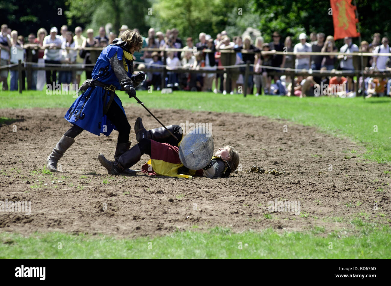 Actors act out a Medieval sword fight at Warwick Castle which takes ...