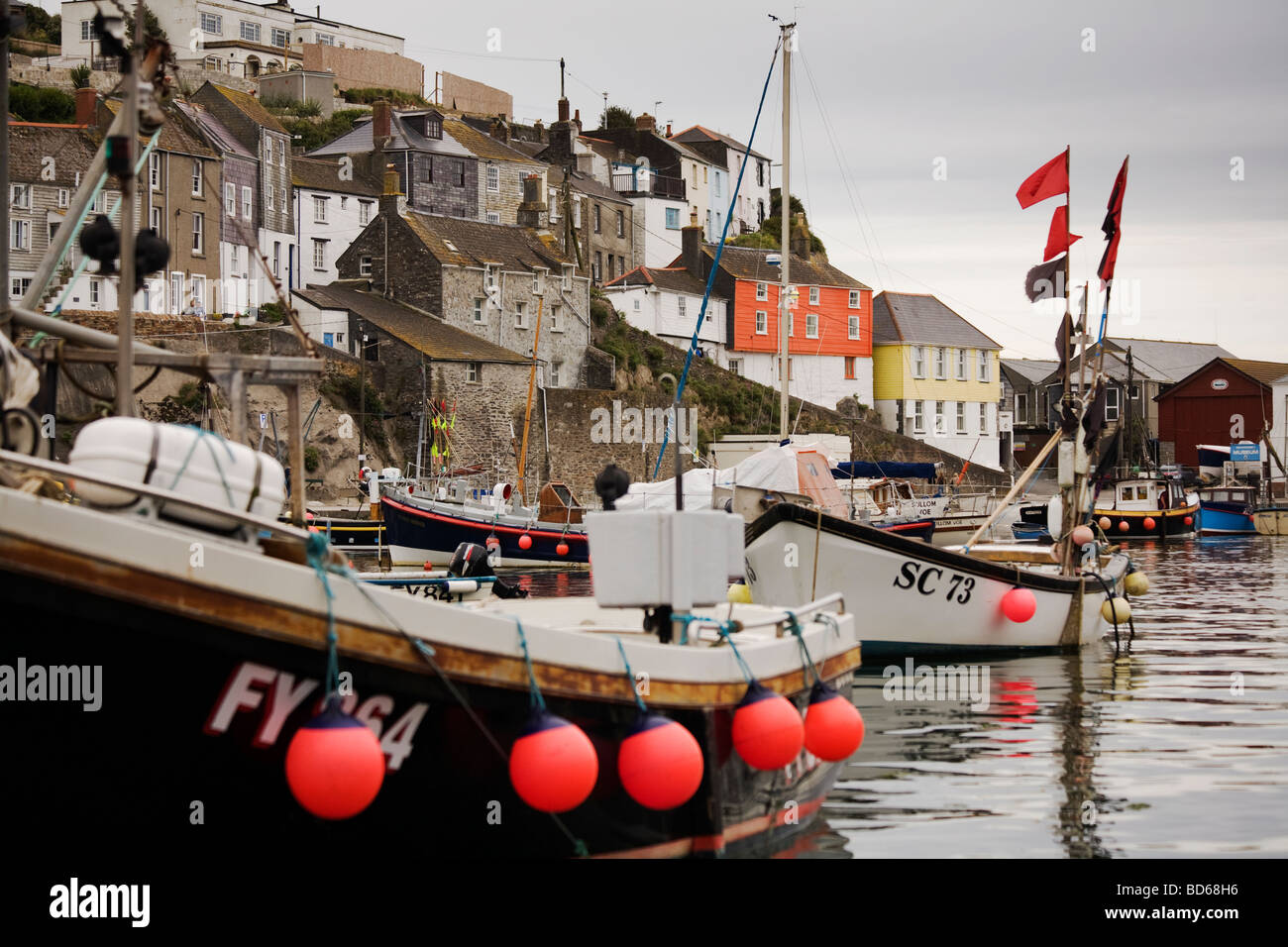 Fishing boats in a Cornish harbour Stock Photo - Alamy