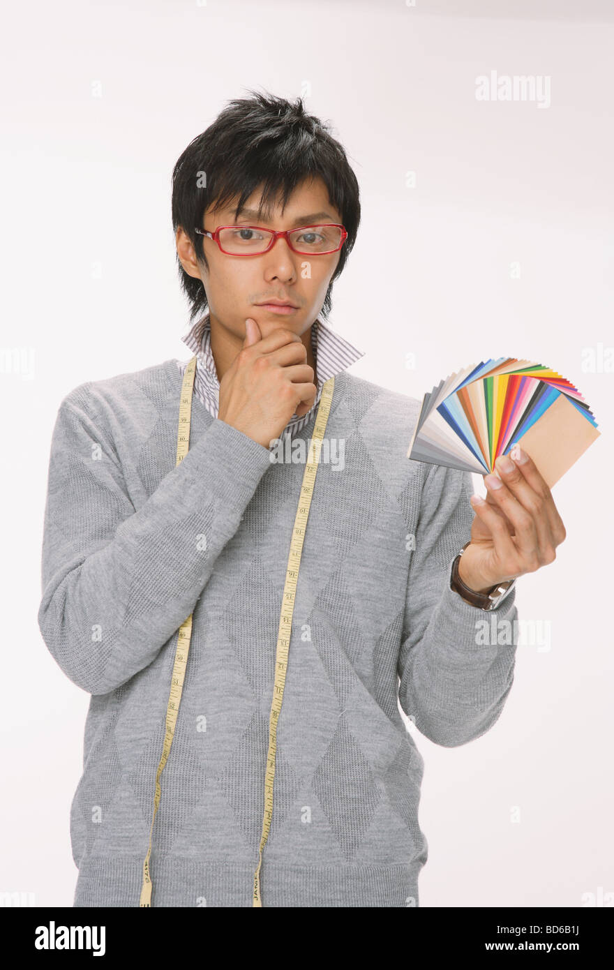 Hand holding colour charts hi-res stock photography and images - Alamy