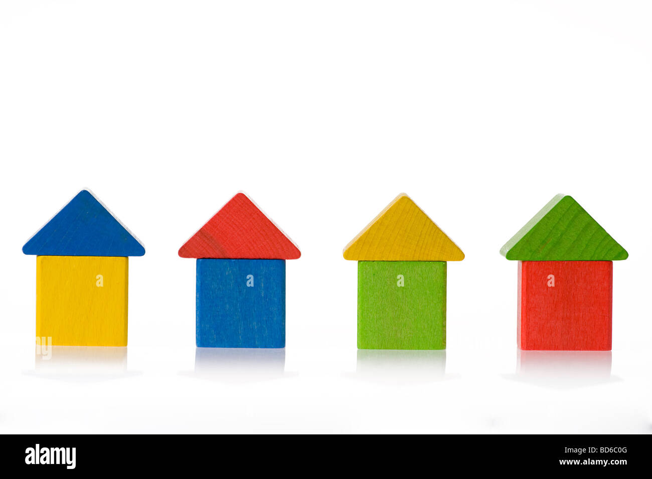 Wooden toy blocks on white background Stock Photo - Alamy