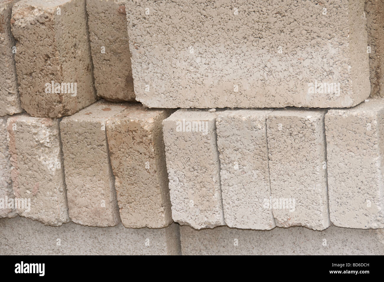 Concrete blocks stacked ready for use Stock Photo - Alamy