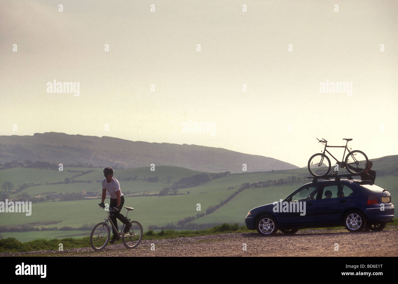 Cyclists setting off on a ride from a car park in Dorset UK Stock Photo ...