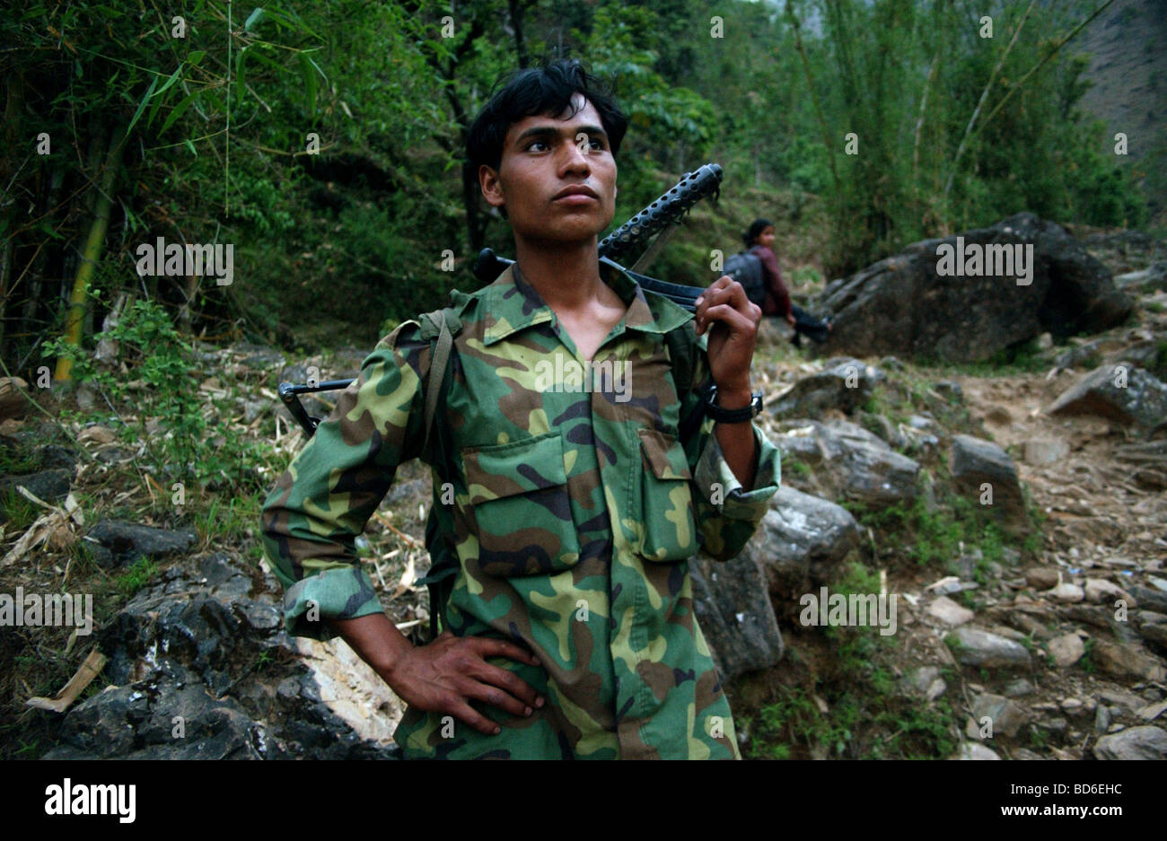 RUKUM DISTRICT NEPAL APRIL 21 2004 Maoist insurgents walk through the ...