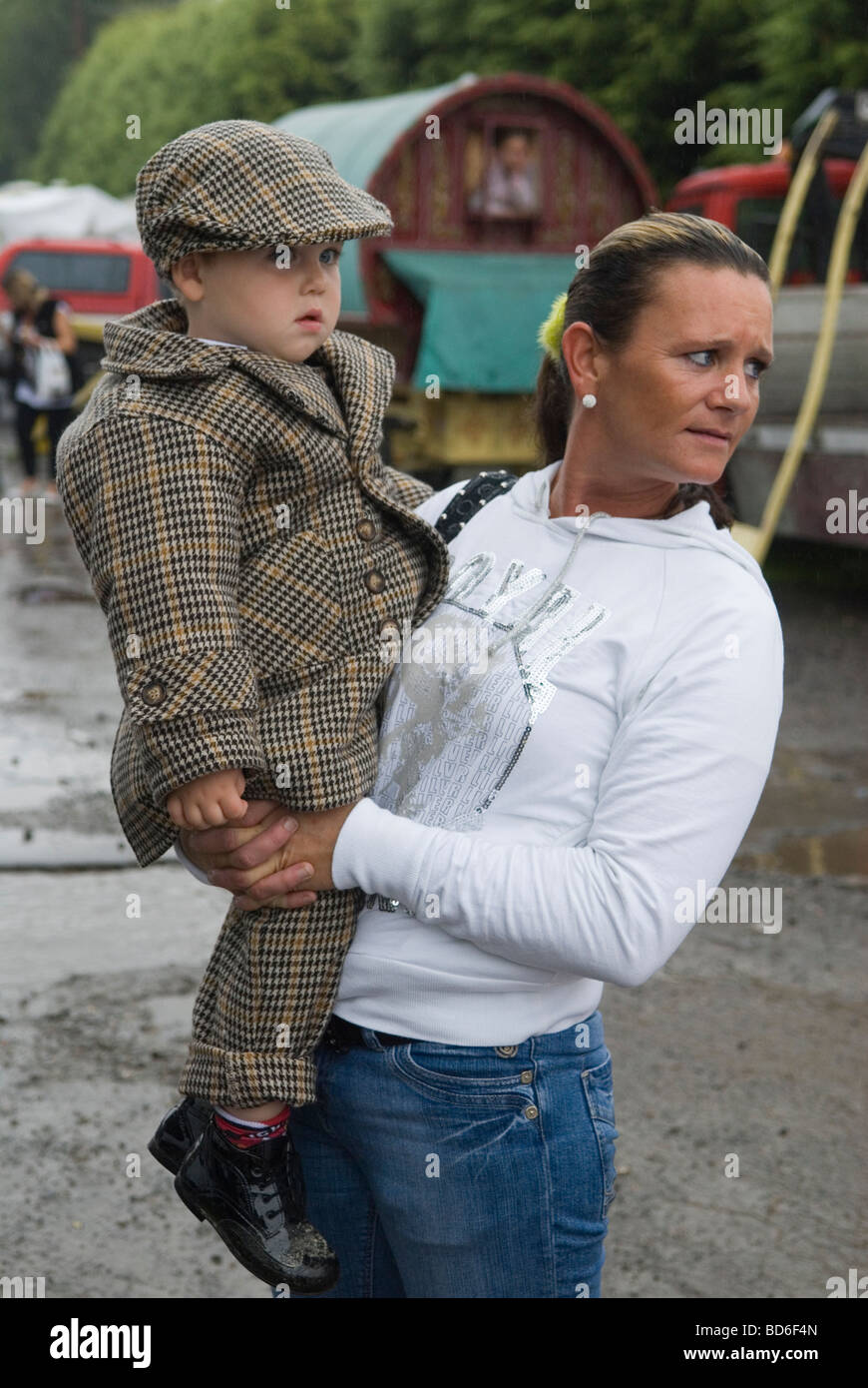 Traveller young gypsy mother and two years old son. Dressed in tweed ...