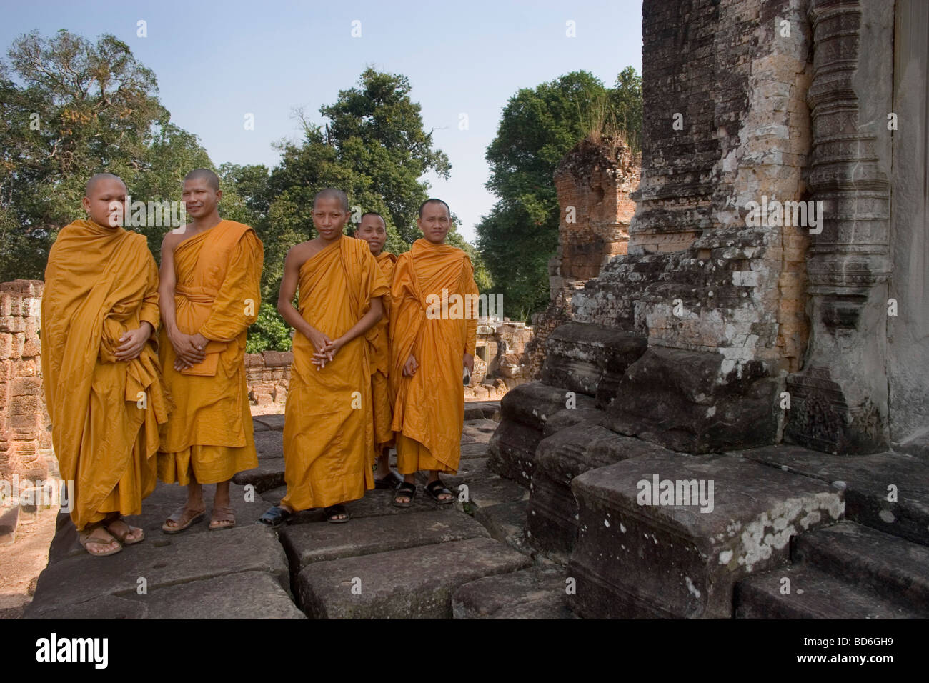 Young Buddhist monks at East Mebon, one of the temples of Angkor in ...
