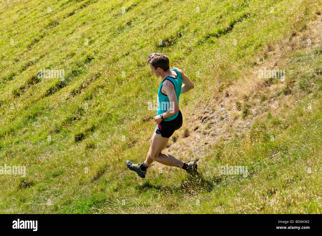 Hill runner Alastair Dunn on his way to win the 2009 Famous Alva Games ...