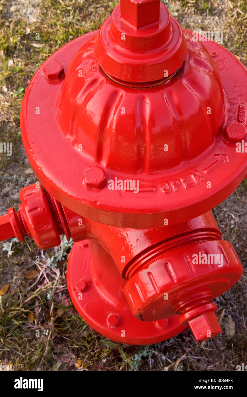 Red fireplug on neglected lawn Stock Photo - Alamy