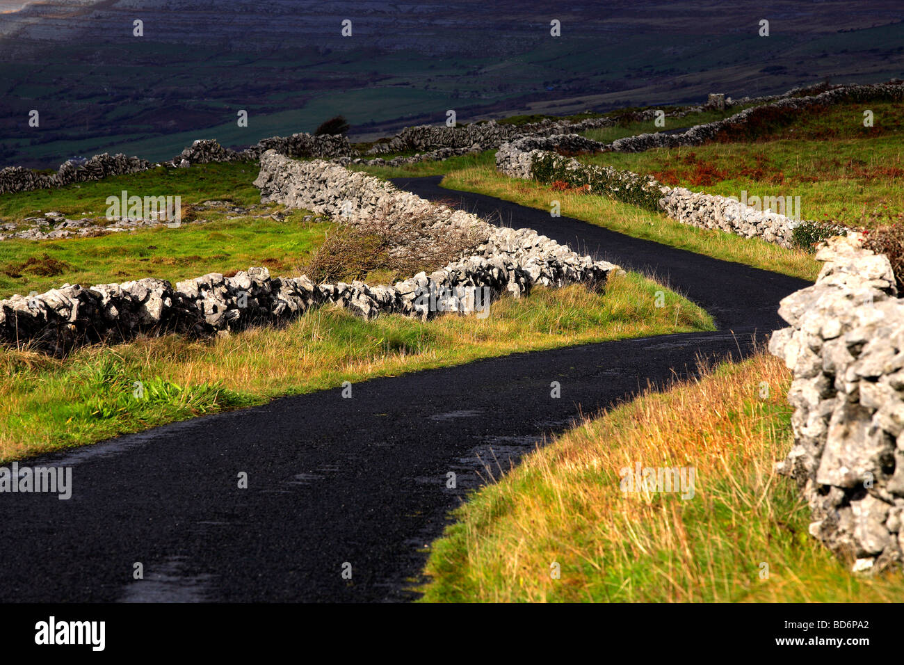 Stone Wall and Roadway Ireland Stock Photo - Alamy