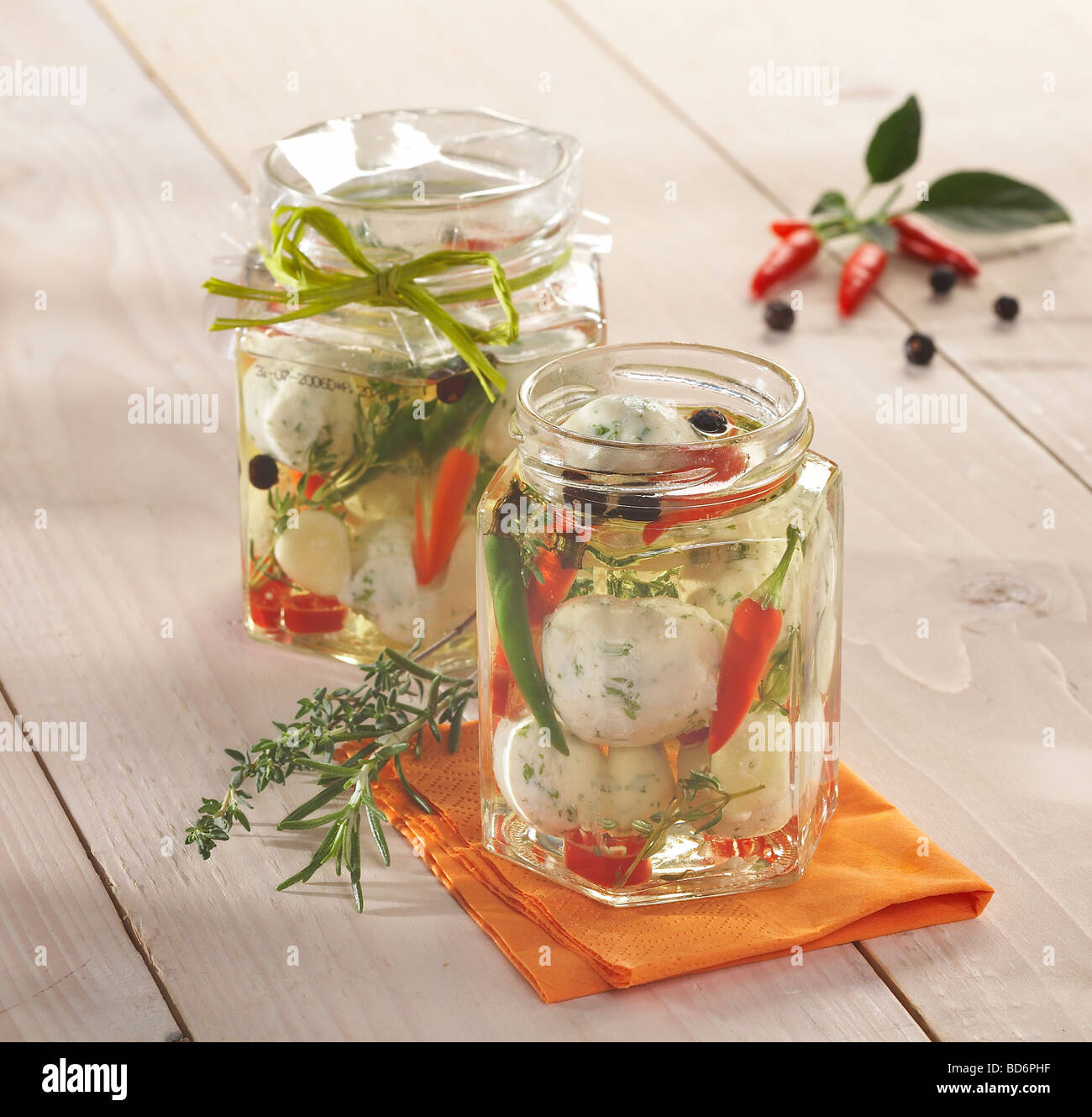 Pickled Sheep Cheese with Hot Peppers Stock Photo - Alamy