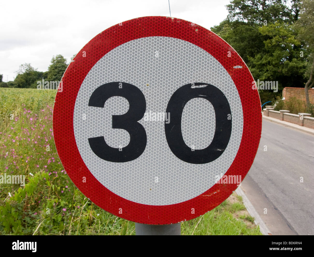 speed sign by a road Stock Photo - Alamy