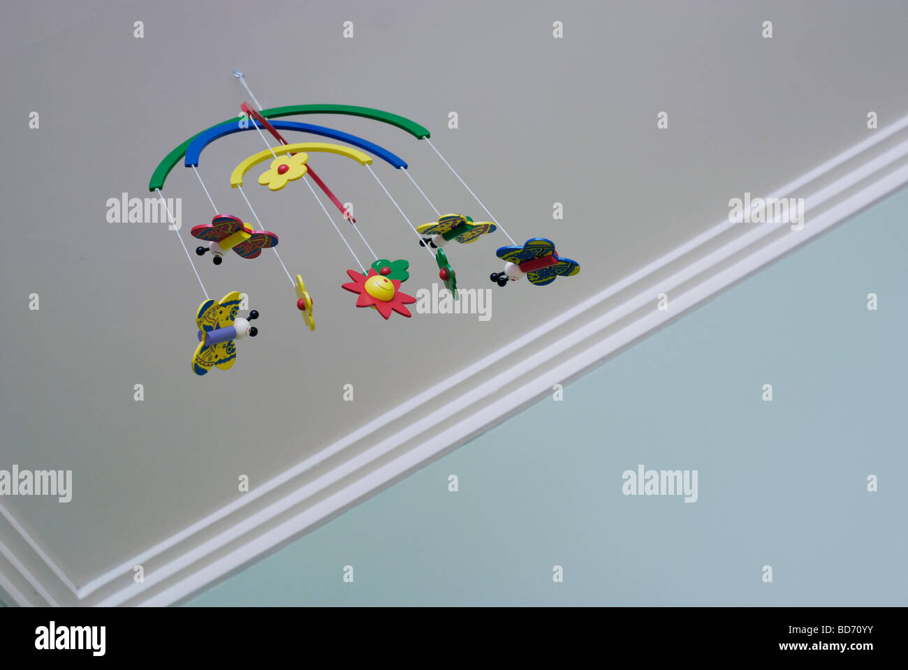 Baby mobile hanging from nursery ceiling Stock Photo - Alamy