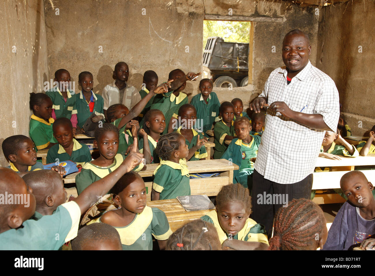 Teachers and children in uniform during lessons, Mora, Cameroon, Africa ...
