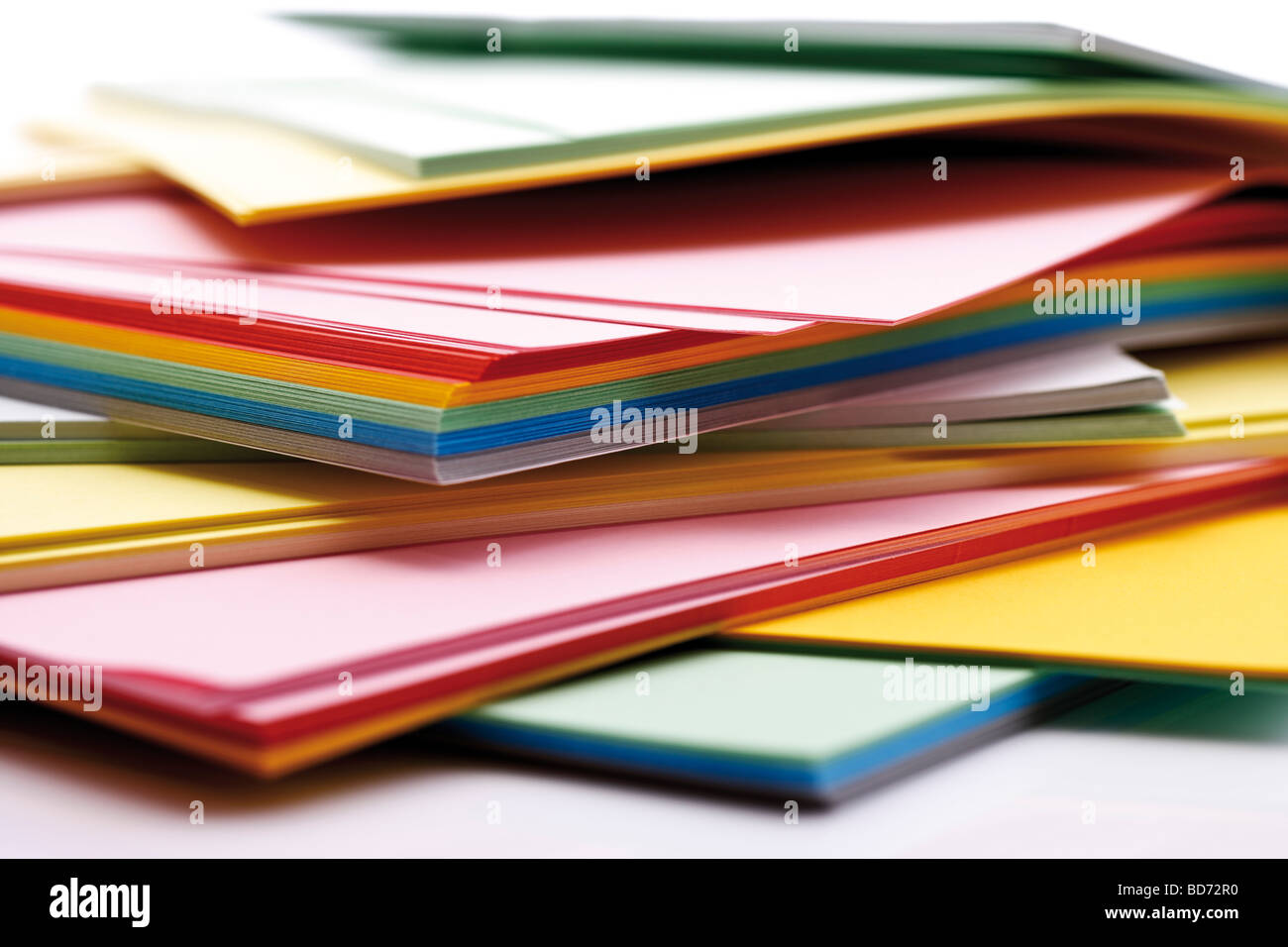 Stack of coloured paper Stock Photo - Alamy