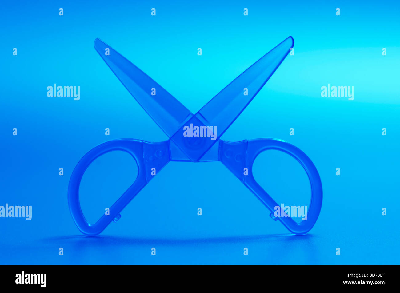 Blue pair of children's scissors Stock Photo - Alamy