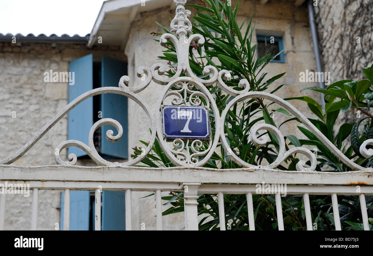 Number seven 7 gate railings entrance shutters Stock Photo - Alamy