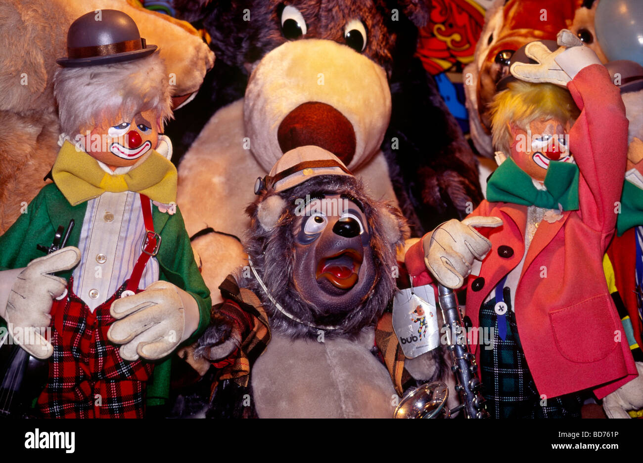Puppets UK. Colourful display of fairground soft toys including clowns ...