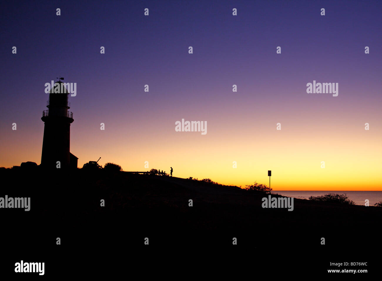 Scenic sunset with the silhouette of Vlaming Head Lighthouse. Exmouth ...