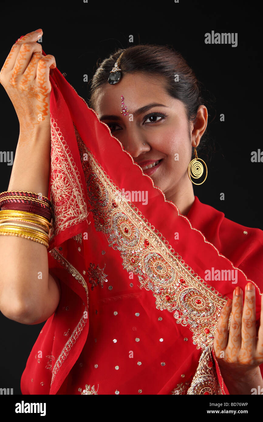 Indian woman dressed in pink hi-res stock photography and images - Alamy