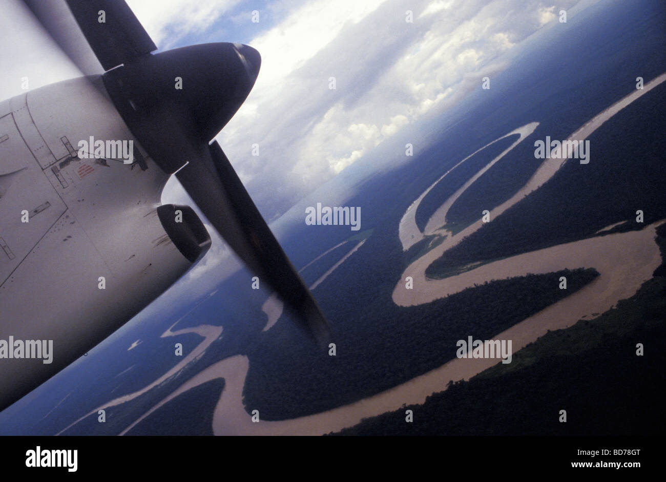 Small airplane flies over Amazon rainforest Brazil Stock Photo - Alamy