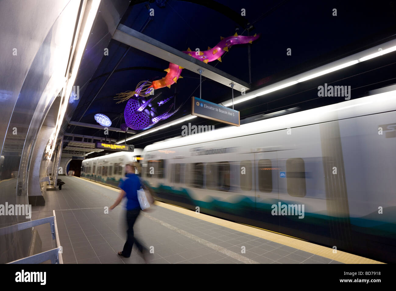 Woman Disembarking a Train at the Beacon Hill Station Sound Transit Link Light Rail, Seattle ...